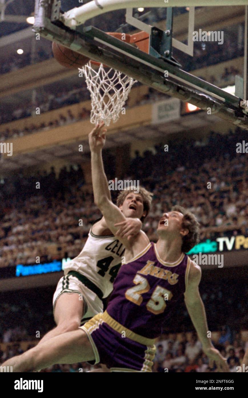 Boston Celtics Denny Ainge, left, is on Los Angeles Lakers Mitch ...