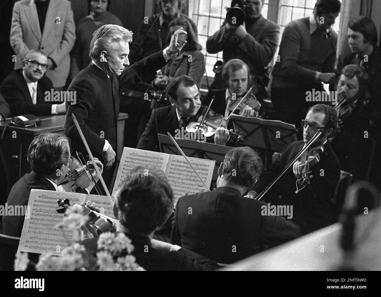 Austrian conductor Herbert von Karajan, center, musical director of the ...