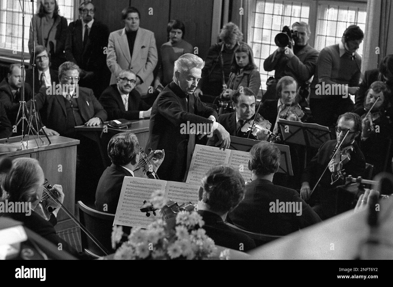 Austrian conductor Herbert von Karajan, center, musical director of the ...