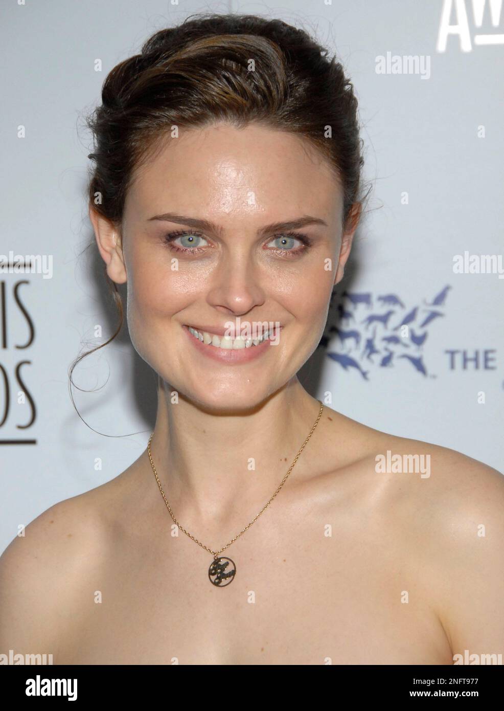 Actress Emily Deschanel poses on the press line at the Genesis Awards ...