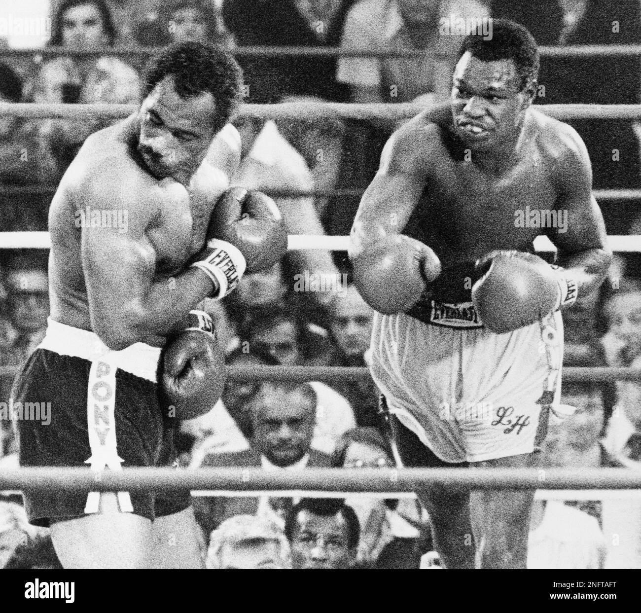 Heavyweight challenger Larry Holmes delivers a right to the jaw of WBC ... Heavyweight challenger Larry Holmes delivers a right to the jaw of WBC ...