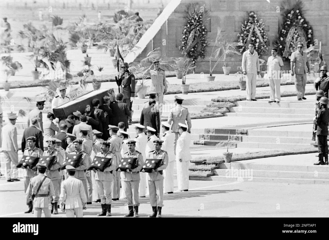 As Egyptian soldiers stand with the medals of assassinated President ...