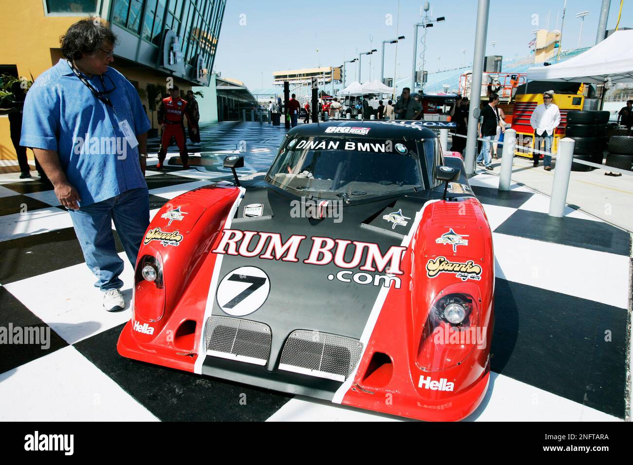 Luis Bacardii looks at his company's new race car at the Homestead ...