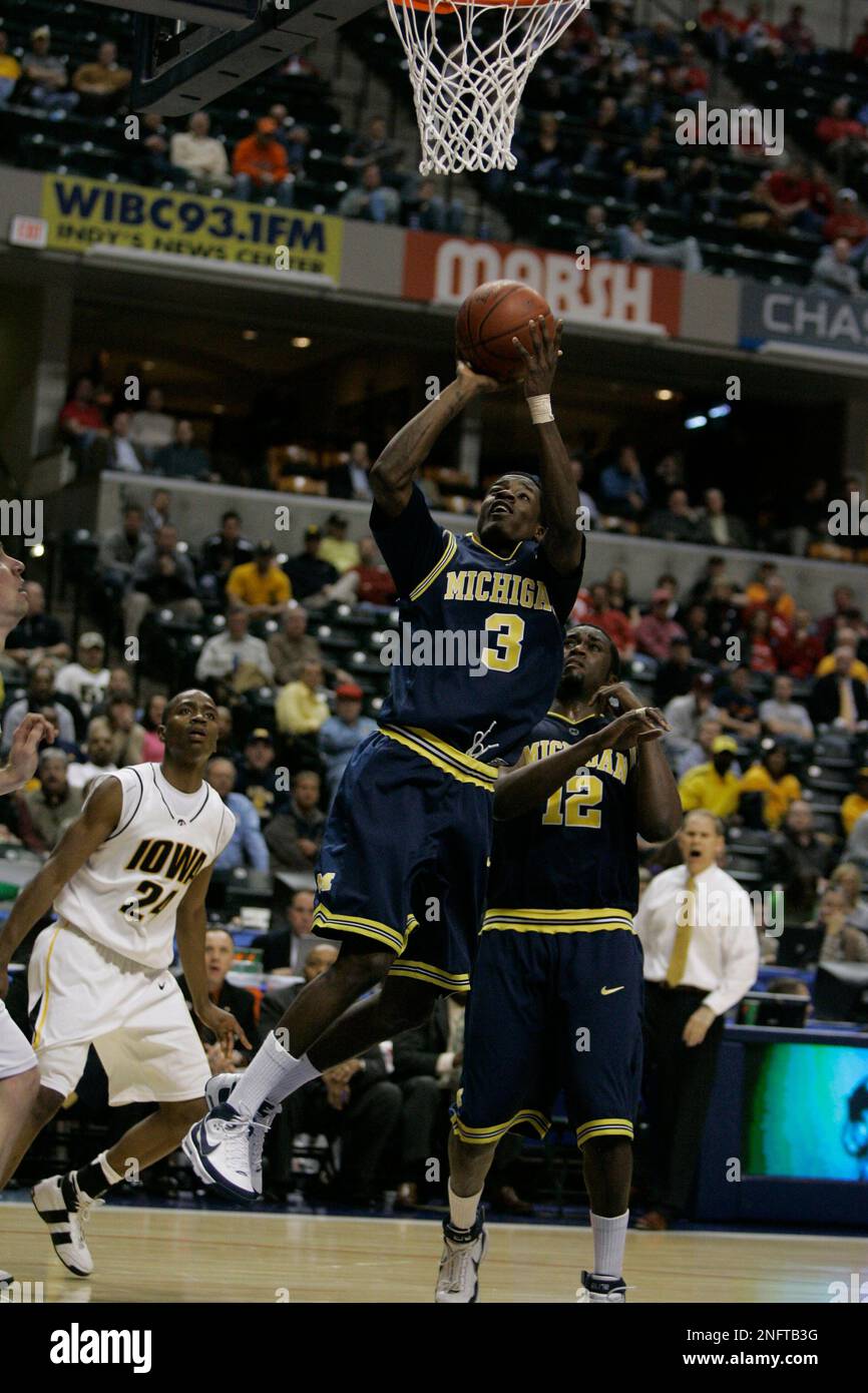 Michigan guard Manny Harris (3) shoots during the second half of an ...