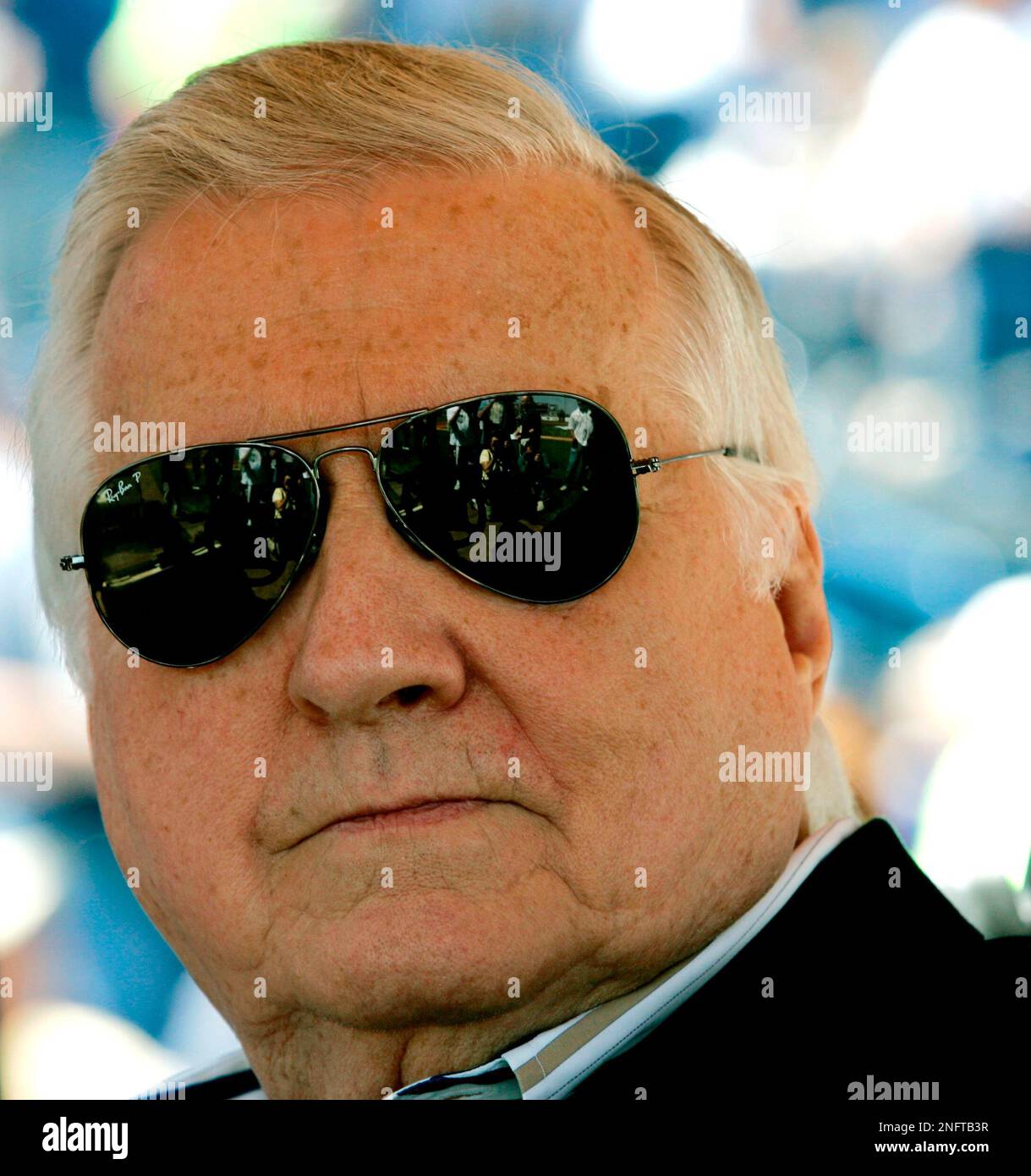 New York Yankees principal owner Goerge Steinbrenner sits in a golf ...