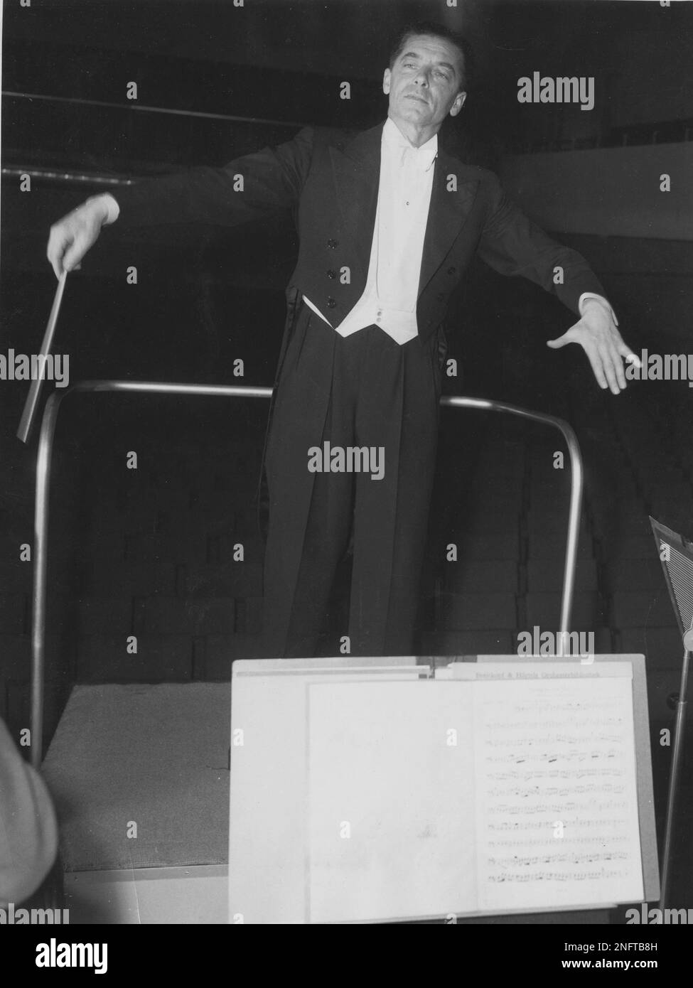 Austrian conductor Herbert von Karajan is pictured at a rehearsal with ...