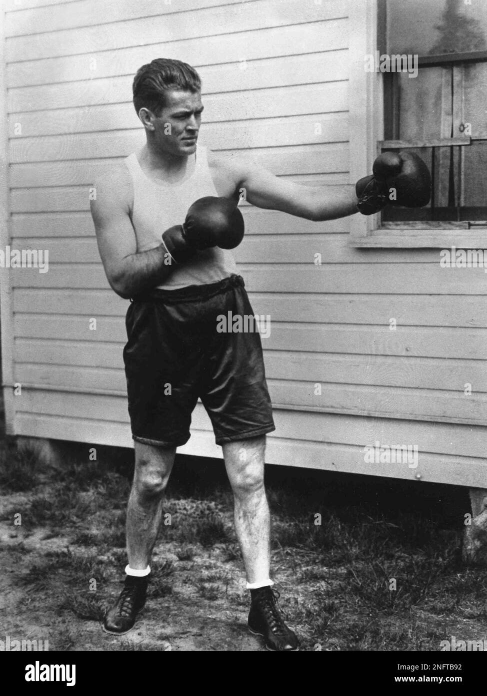 American Heavyweight boxing champion Gene Tunney, at his training camp ...