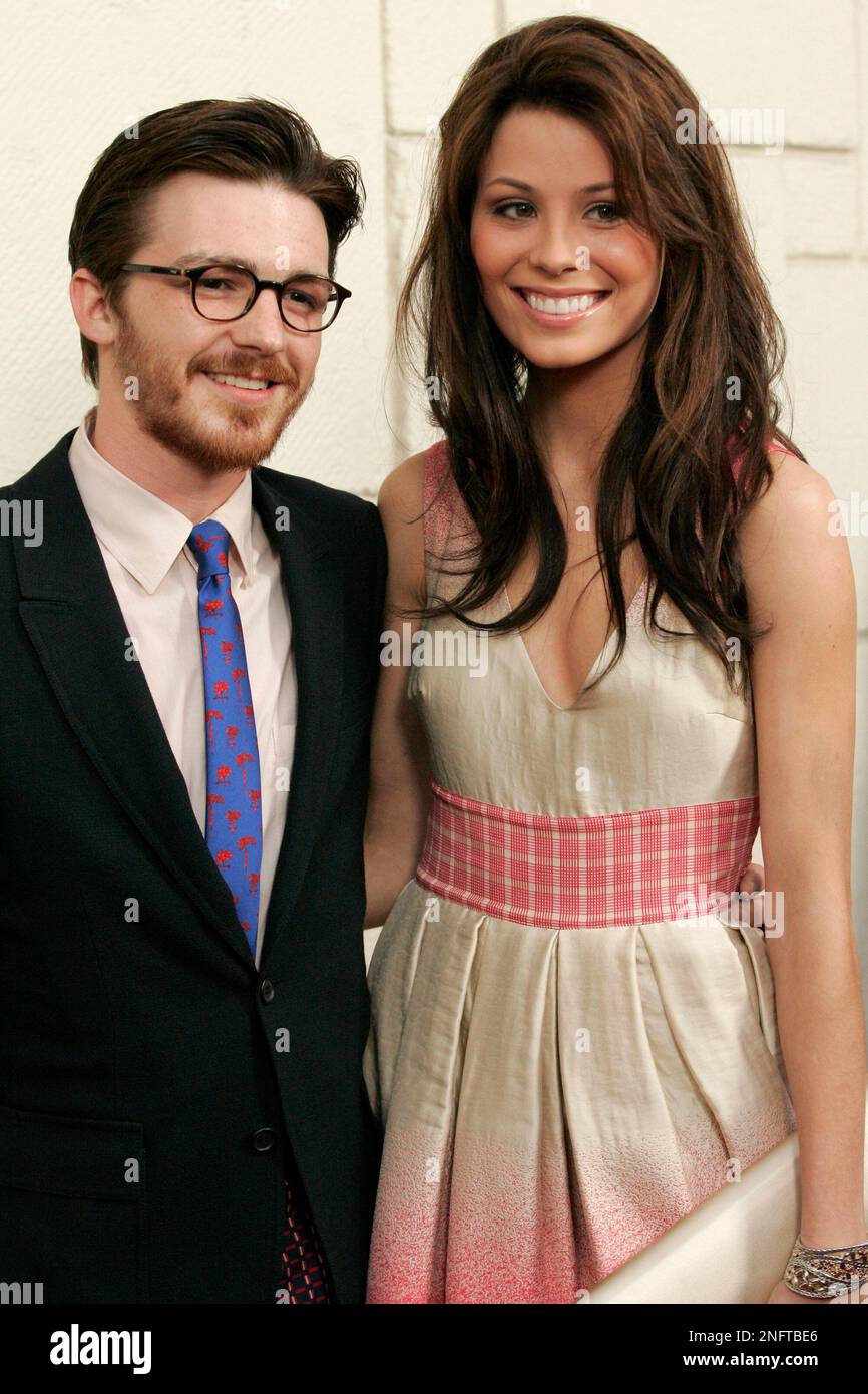 Actor Drake Bell, left, and Melissa Lingafelt pose on the press line at ...