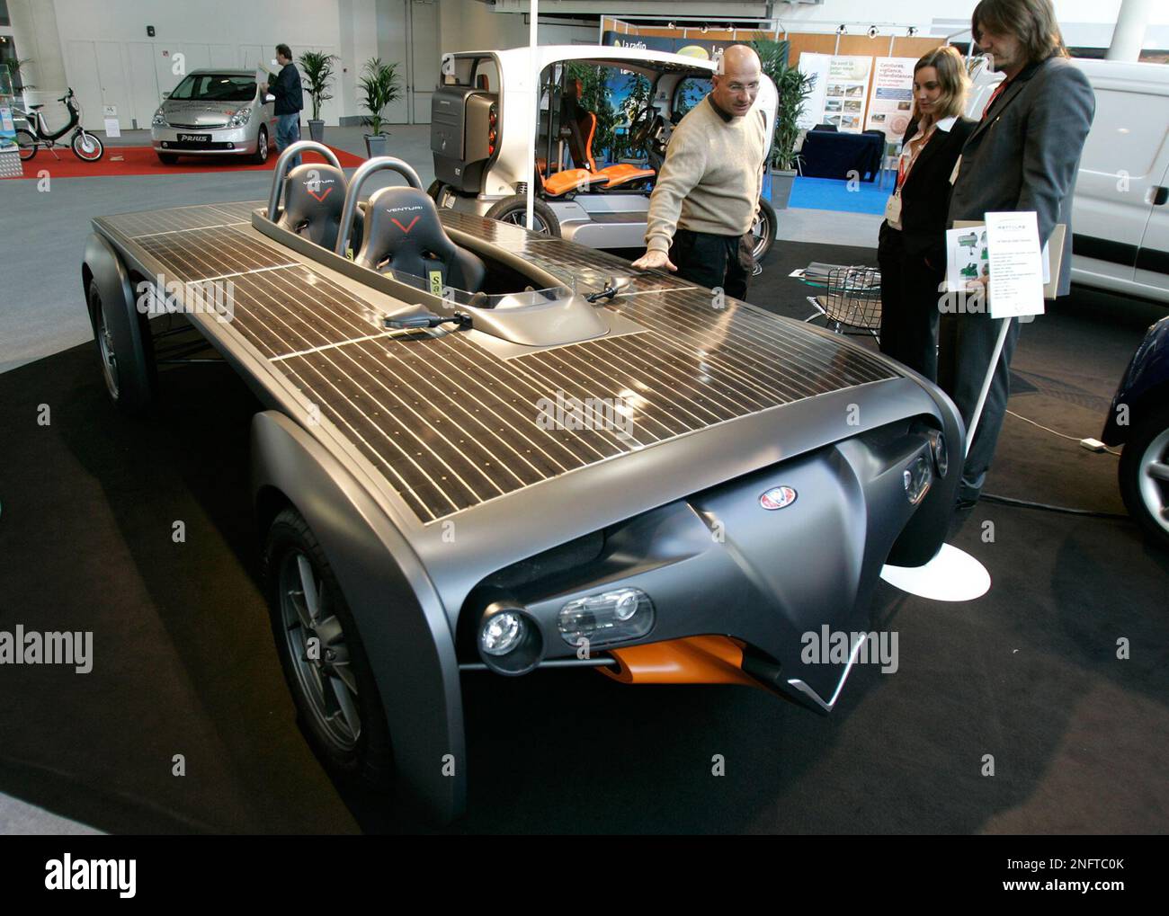 Visitors look at the Astrolab by Venturi, the first electro-solar ...
