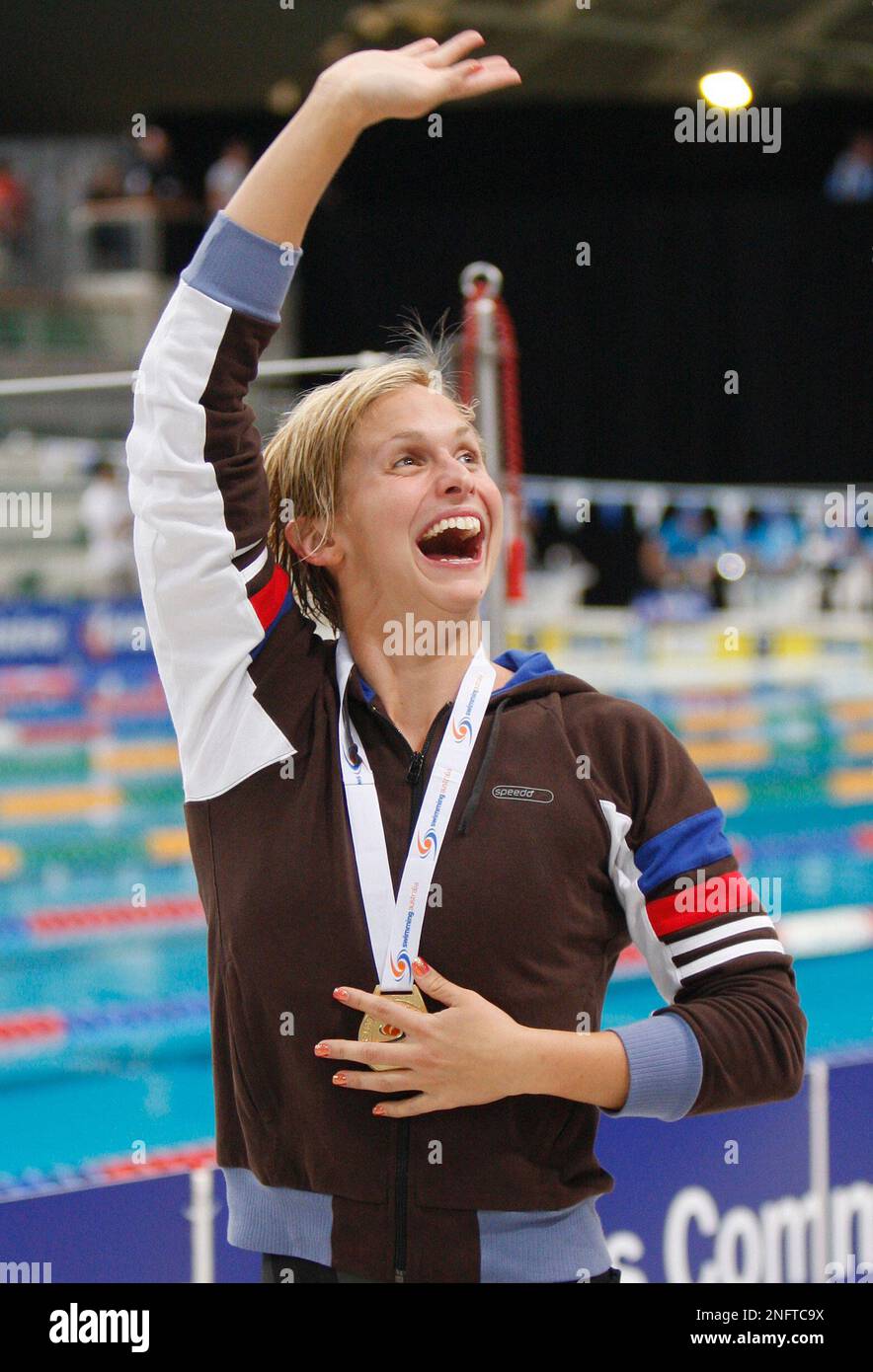 Australia's Libby Trickett waves to the crowd as she celebrates her ...