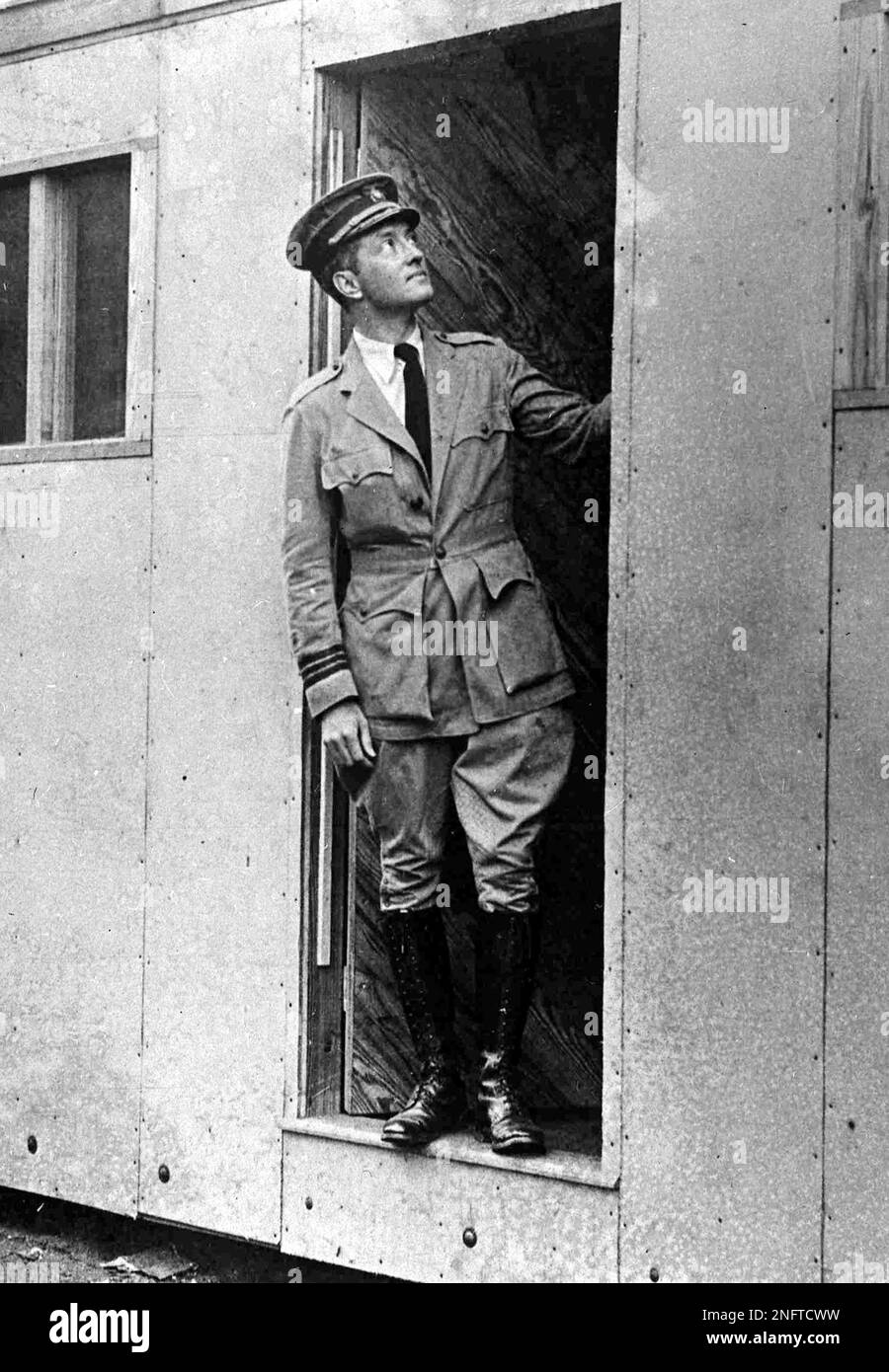 American polar explorer Commander Richard Byrd in the doorway of one of ...