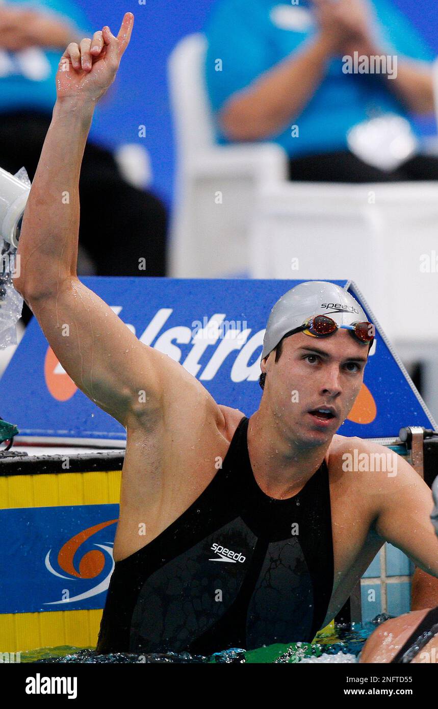 Australia's Eamon Sullivan reacts after winning the men's 100 meter ...