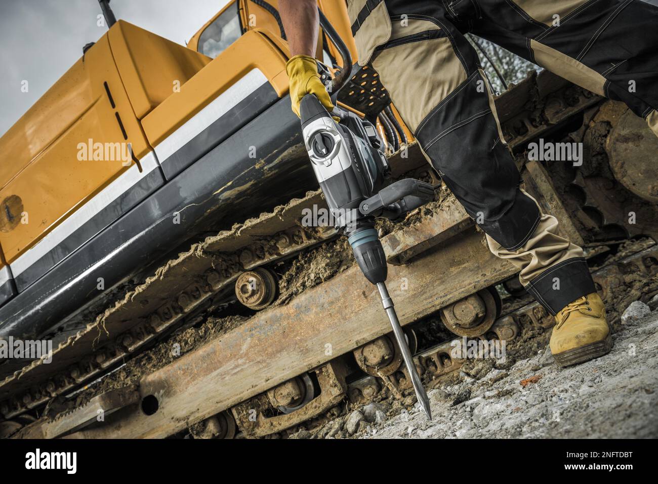 Professional Construction Worker with Jack Hammer in His Hands Standing ...