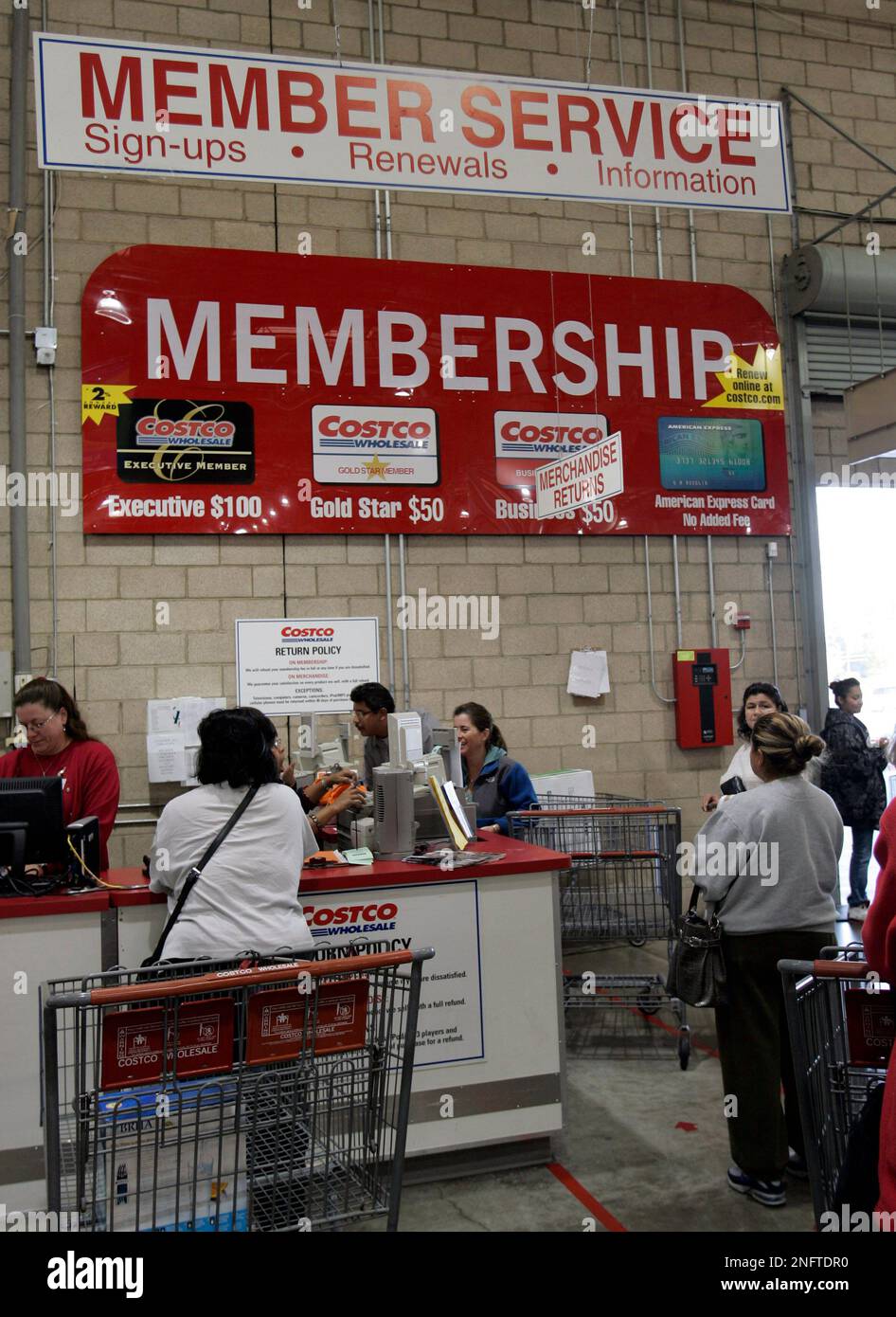 Costco members in line at a Costco store in Mountain View, Calif ...