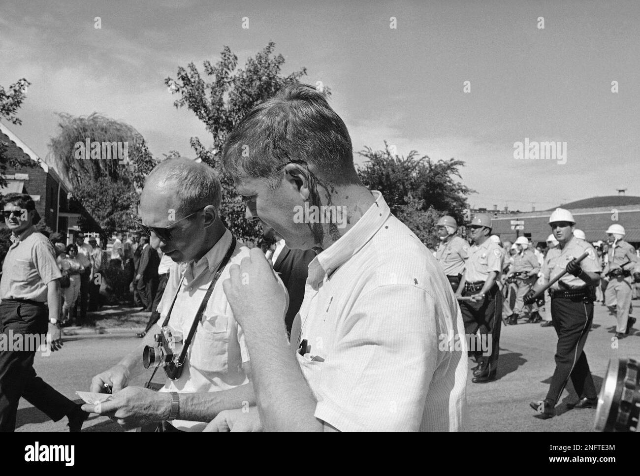 Magazine reporter John Frook, at right, surveys civil rights march on ...