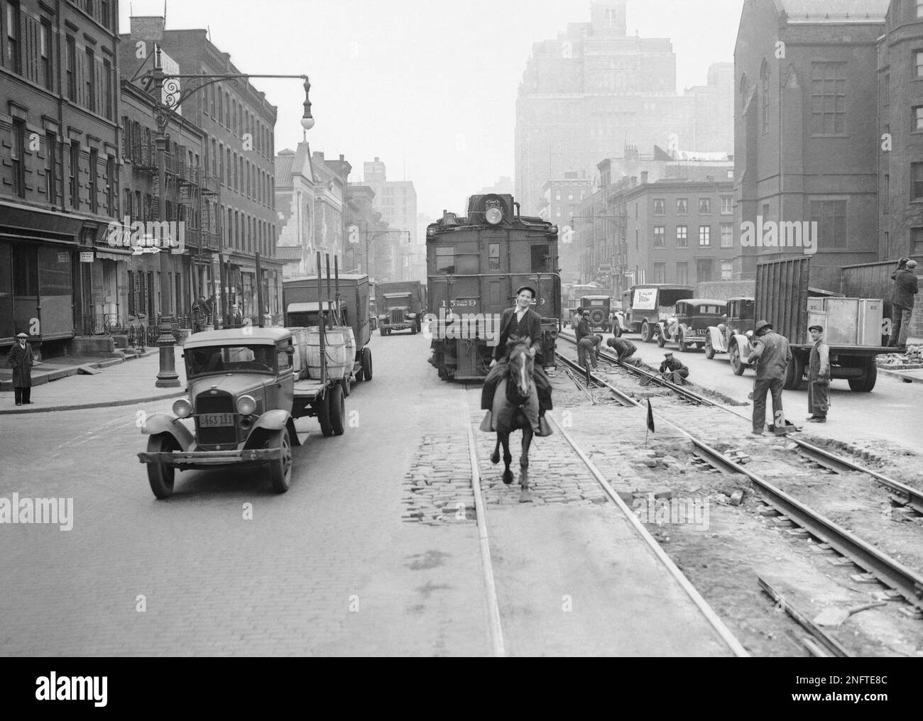William Connolly, known as the 11th Avenue Cowboy, is shown on the job ...