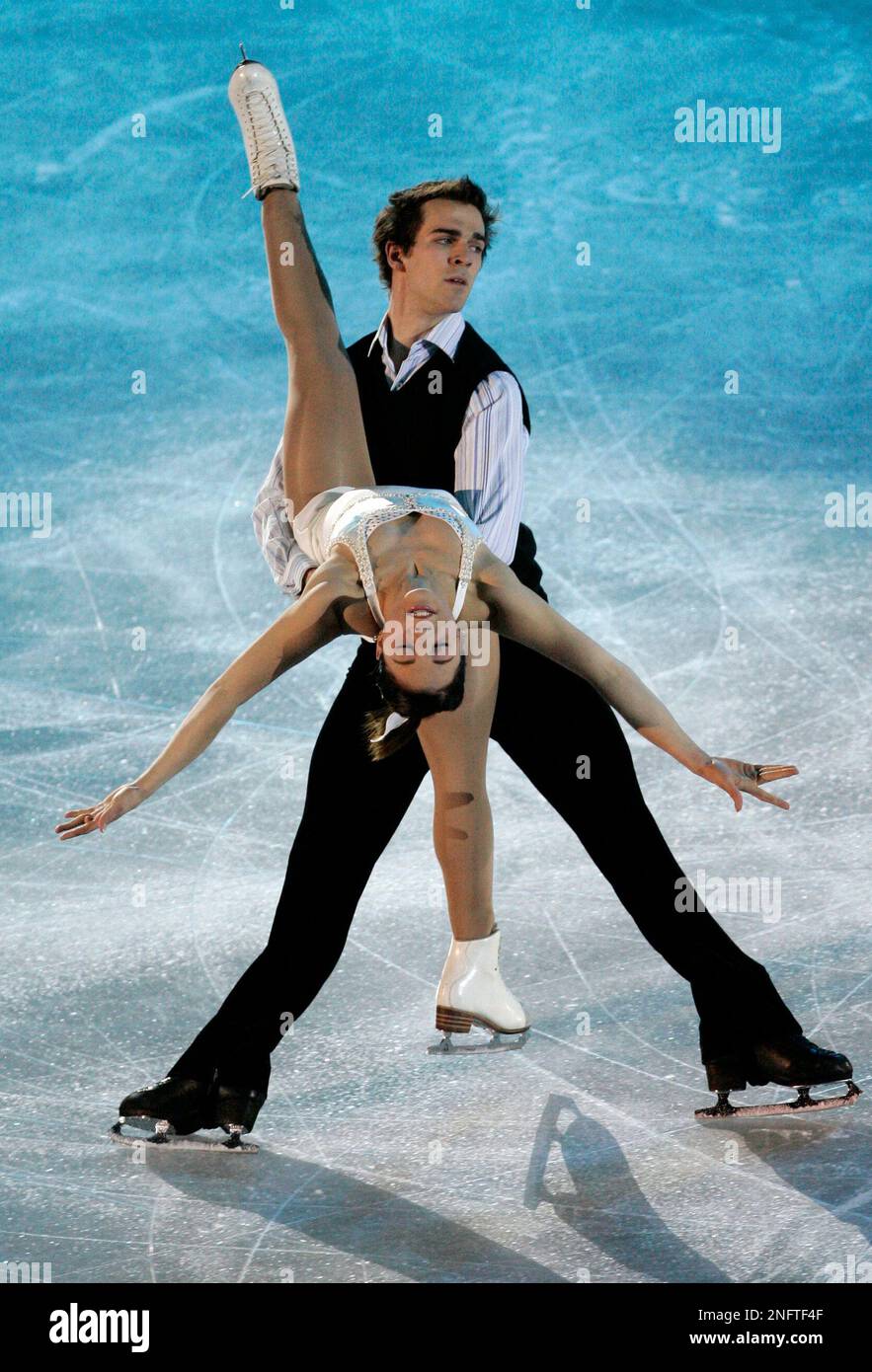 Canada's Jessica Dube, front, and Bryce Davidson, back, perform during ...
