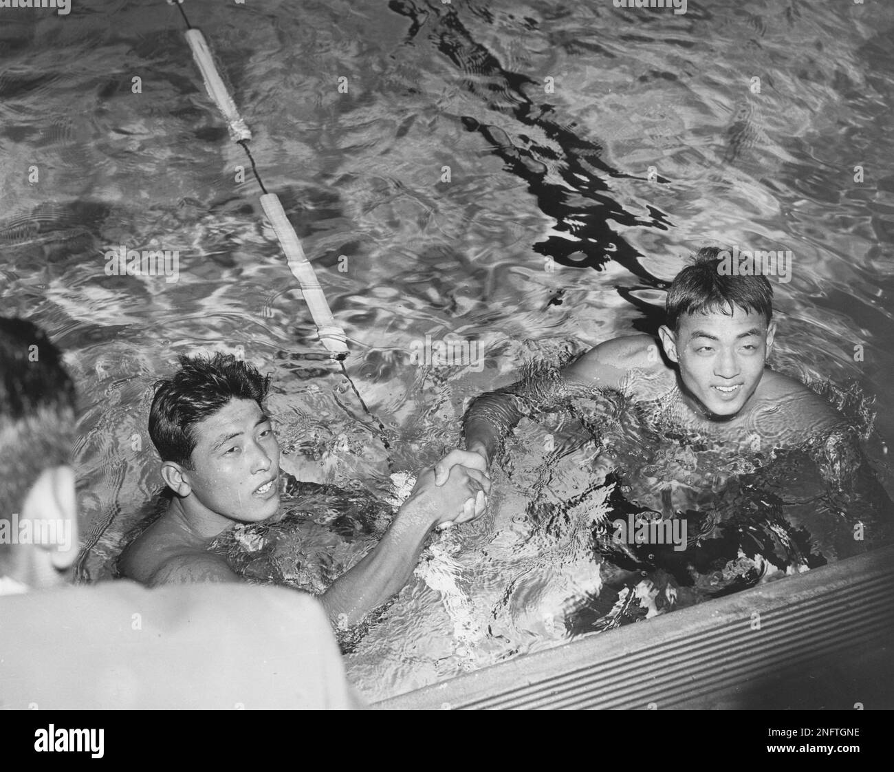 Hironoshin Furuhashi, left, and Shiro Hashizume, members of a Japanese ...