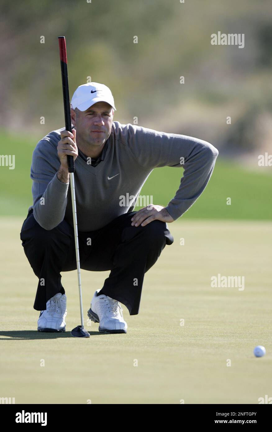 Stewart Cink lines up his putt during the second round of the Accenture ...