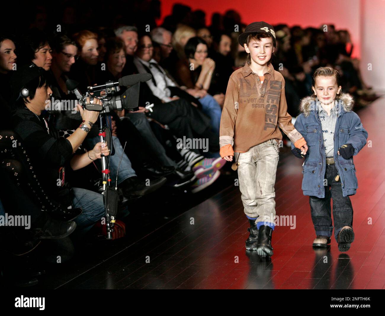 Child models wear creations by Diesel during L'Oreal Fashionweek in ...