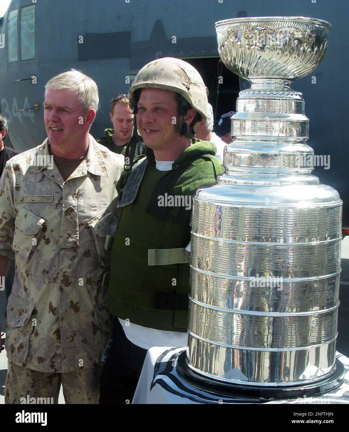 Gen. Rick Hillier, chief of defense staff, poses with Michael Blanchard ...