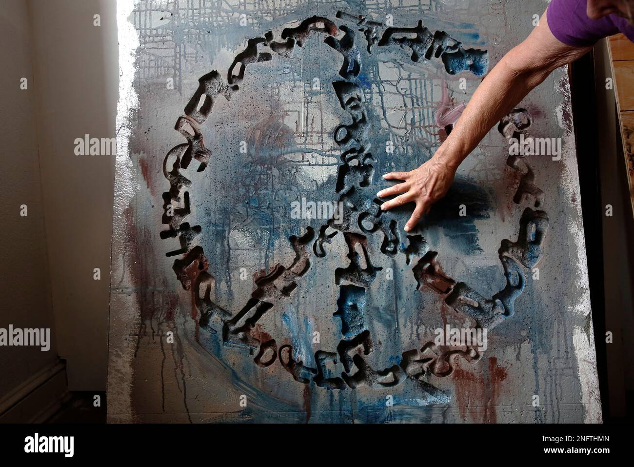 Artist Jean Cherie is part of a collaboration of artists working on an ...
