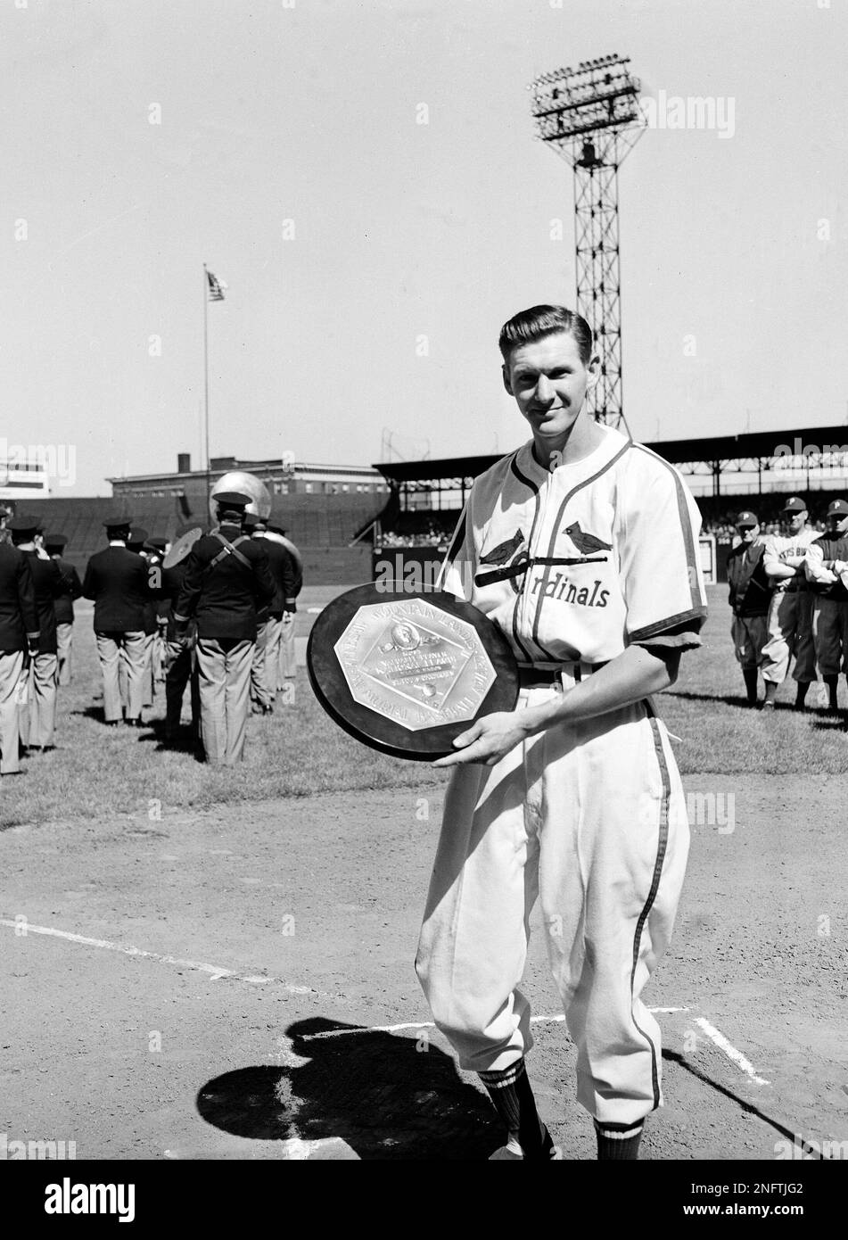 St. Louis Cardinals' Marty Marion holds his Kensaw Mountain Landis ...