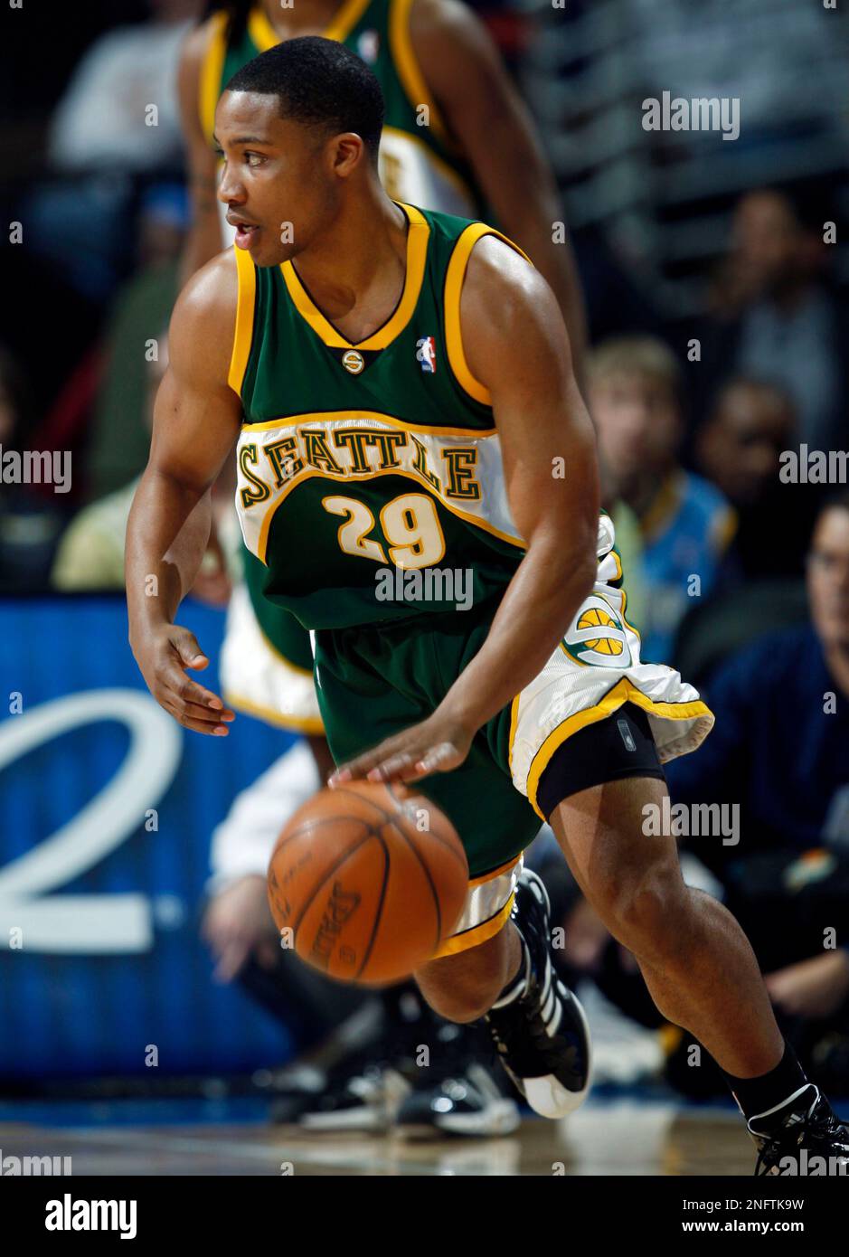 Seattle SuperSonics guard Mike Wilks works the ball inside against the ...