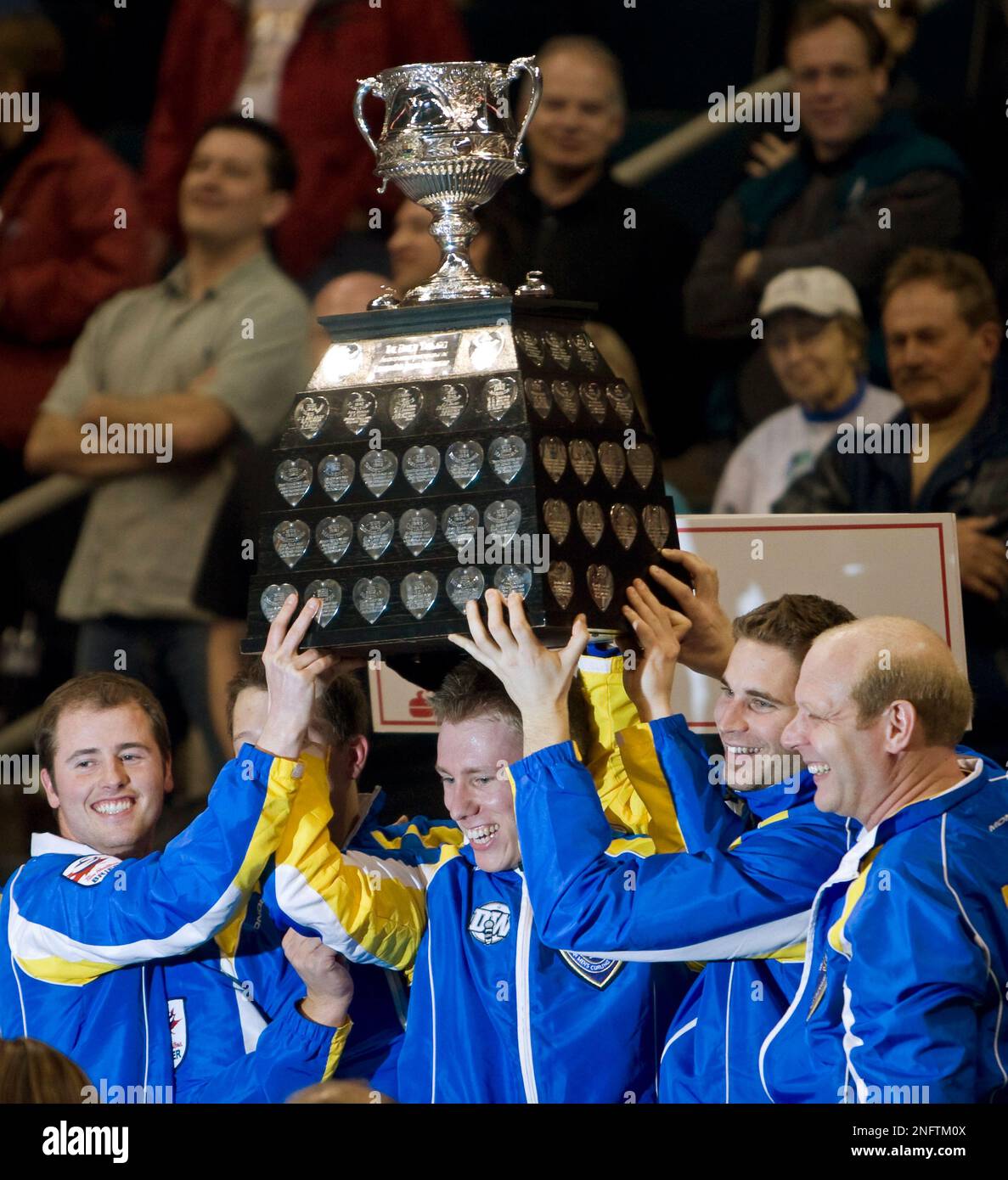 Alberta skip Kevin Martin (right), third John Morris (second from right ...