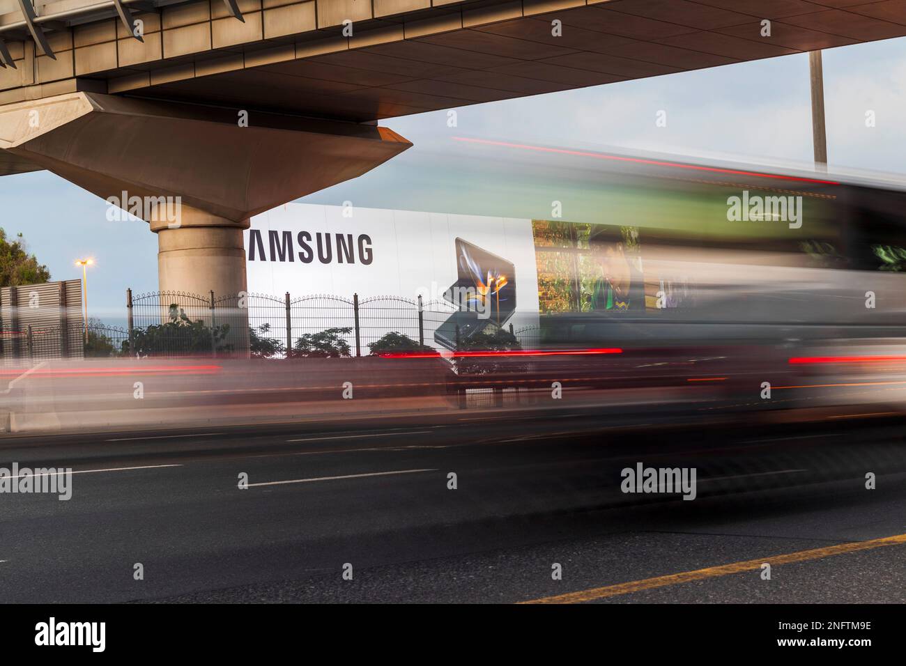 Dubai, UAE - 12.21.2022 - Advertisement boards on main road of the city ...