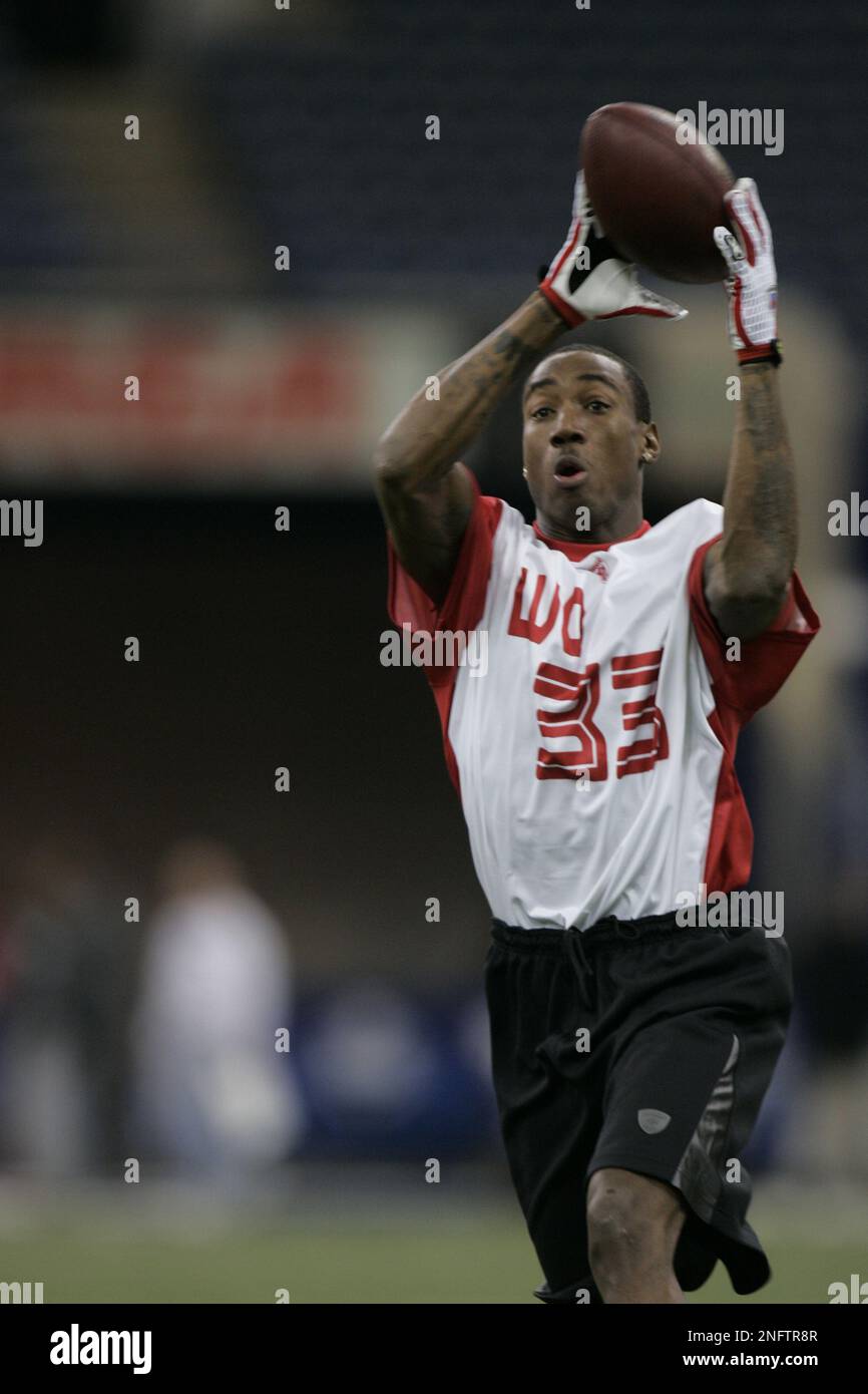Receiver Mario Manningham of Michigan runs a drill at the NFL Combine ...