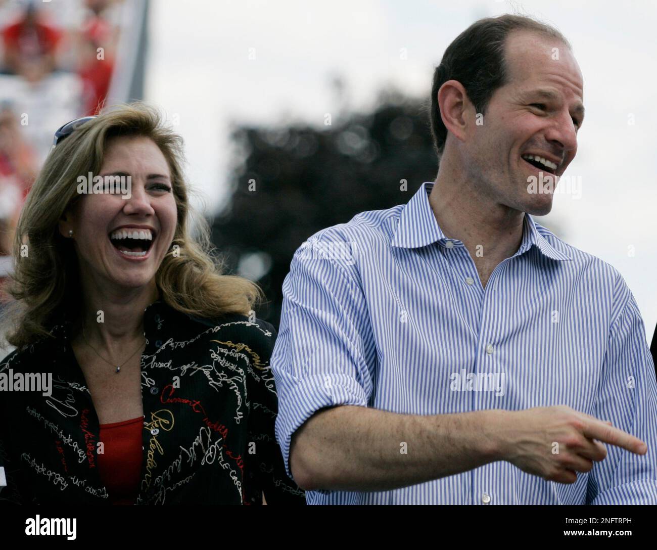 New York Gov. Eliot Spitzer, middle, and his wife Silda Wall Spitzer ...