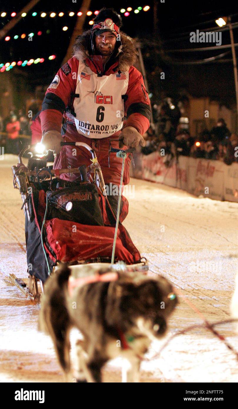 Lance Mackey drives his dog team to the finish line of the Iditarod ...