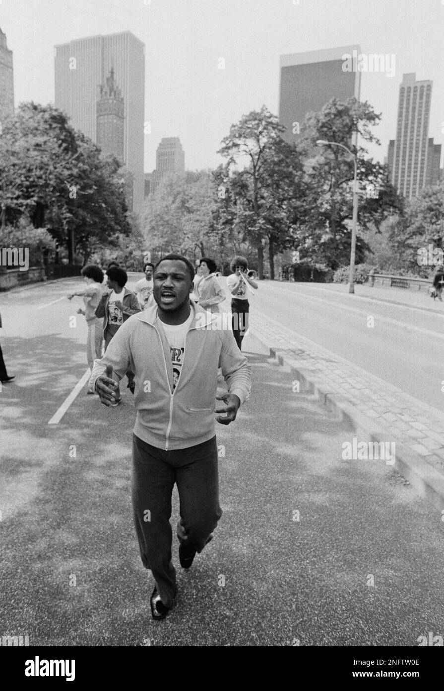 Smokin' Joe Frazier jogs in Central Park ,in New York with his group on ...