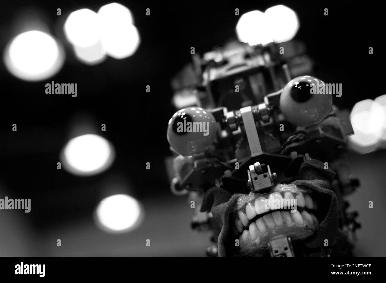 A humanoid robot, without its facial skin, is displayed at Japan's ...