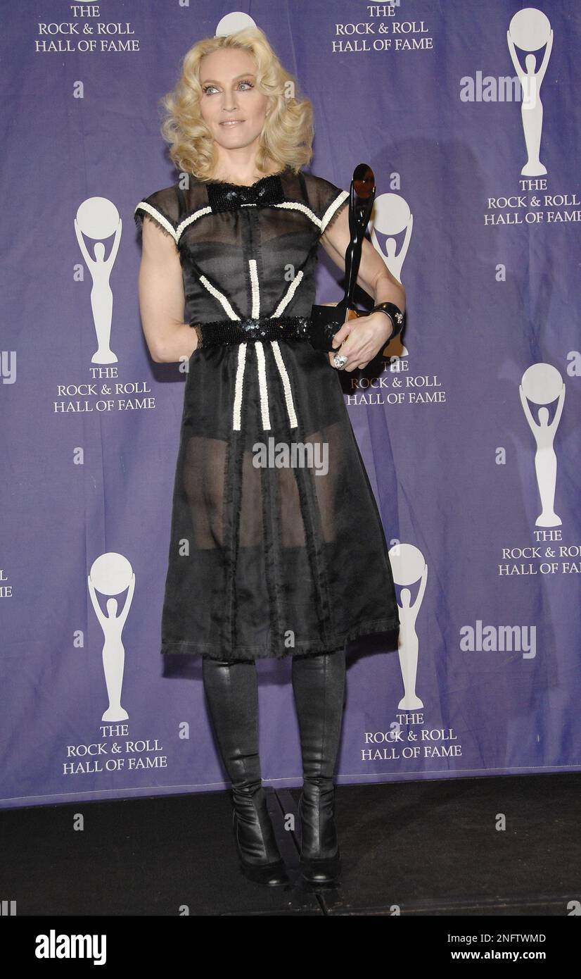 Madonna poses backstage at the Rock and Roll Hall of Fame Induction ...