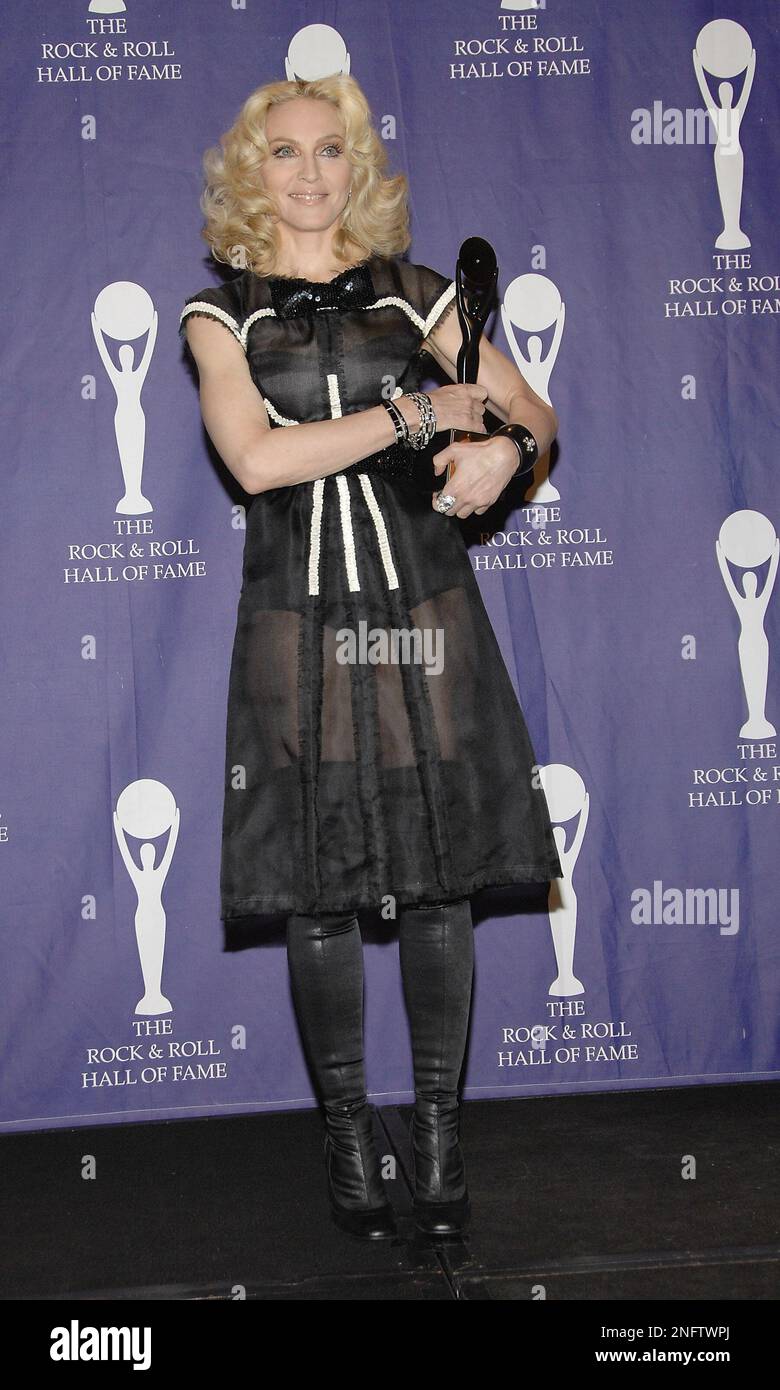 Madonna poses backstage at the Rock and Roll Hall of Fame Induction ...