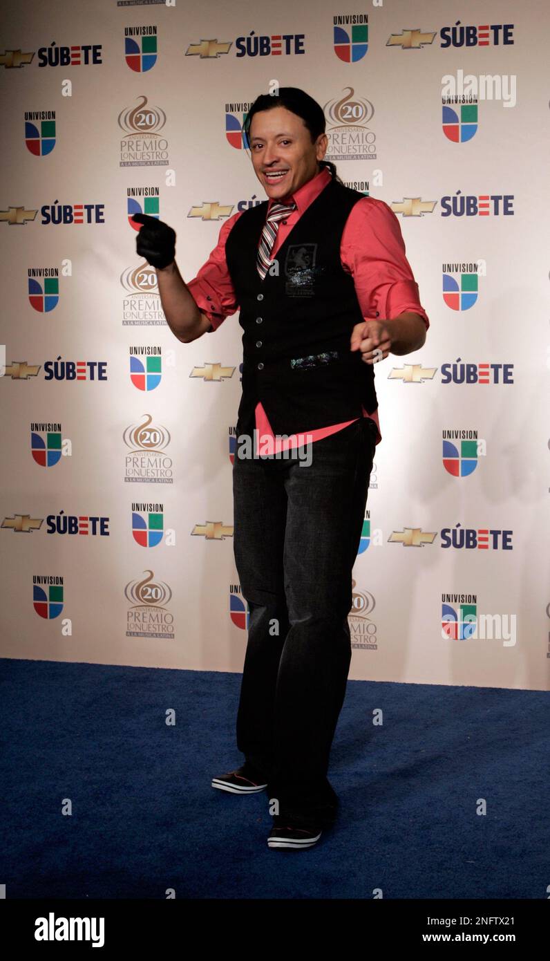 Musician Elvis Crespo poses backstage during the Premio Lo Nuestro ...