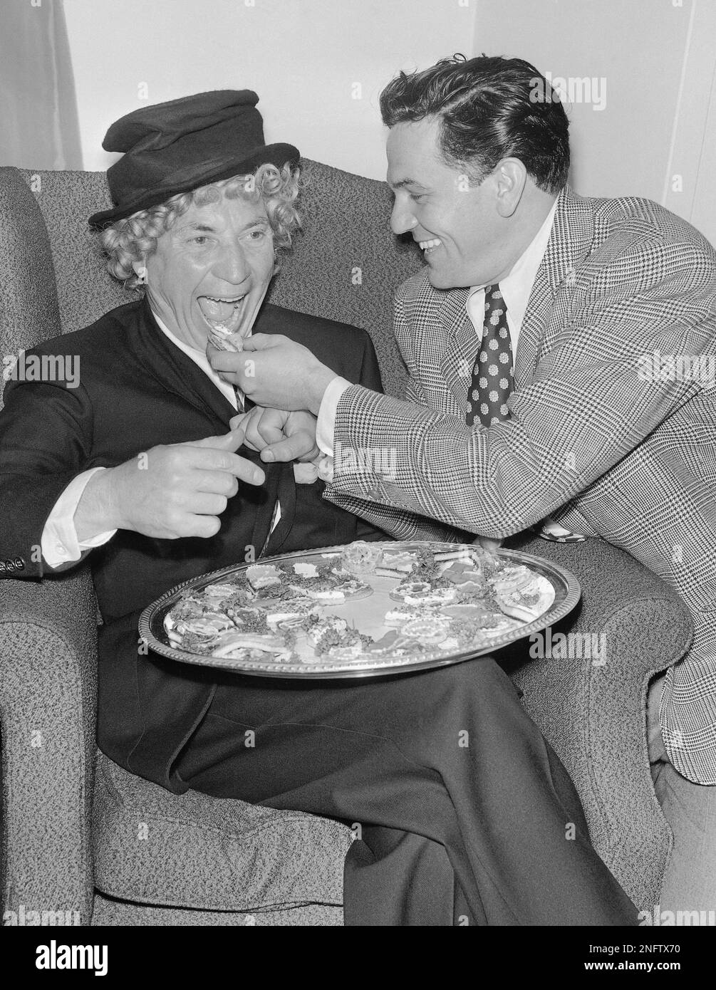 Harpo Marx was guest of honor at a party at the Hampshire house on May ...