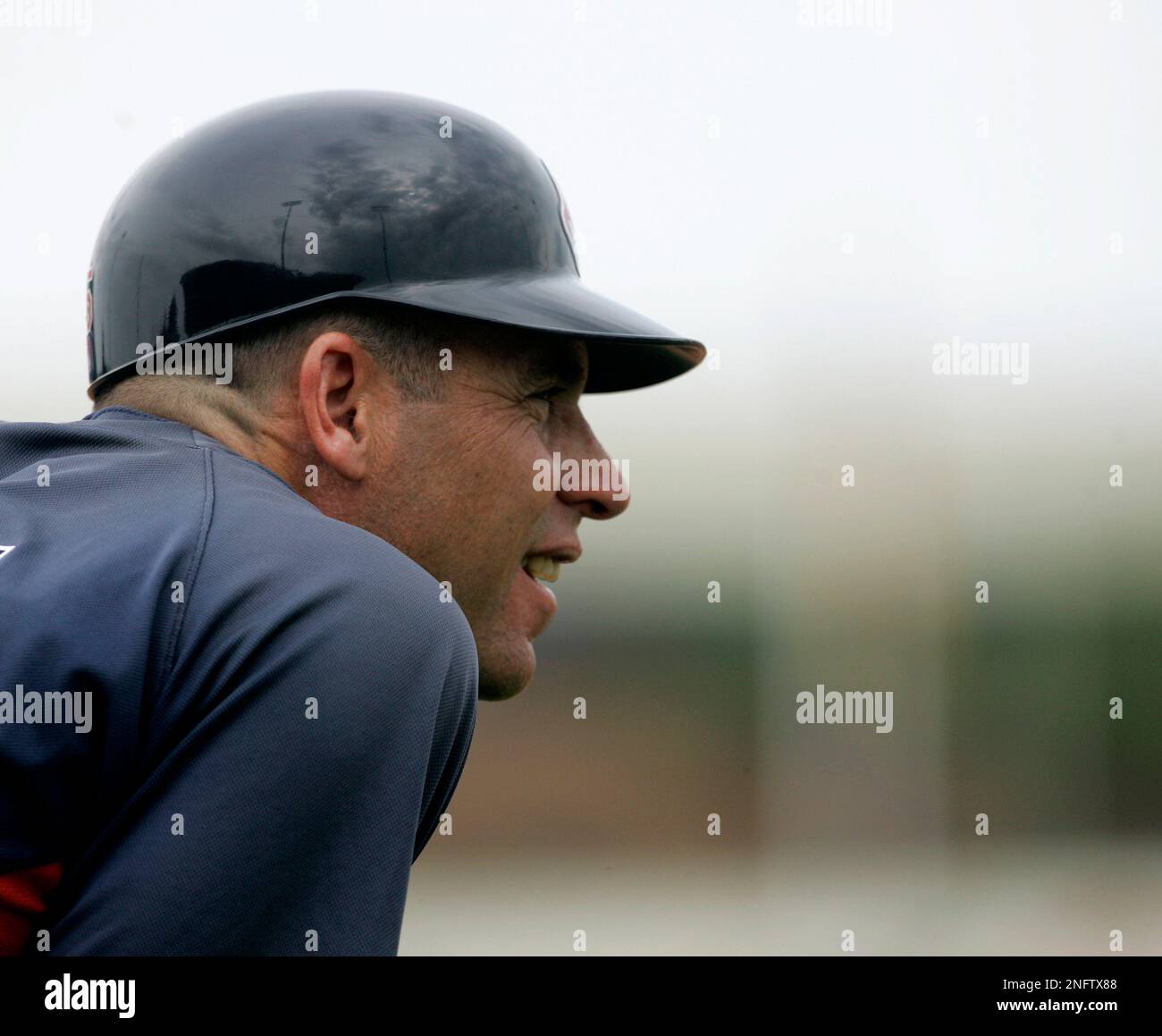 Cleveland Indians third base coach Joel Skinner watches the Indians bat ...