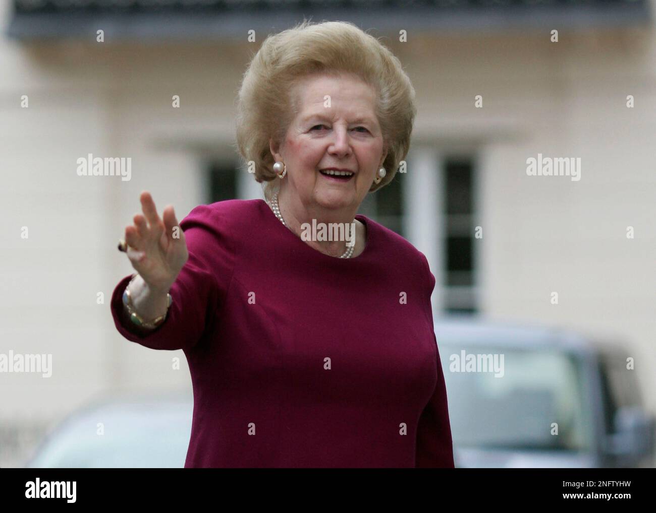 Former British Prime Minister, Margaret Thatcher waves as she arrives ...
