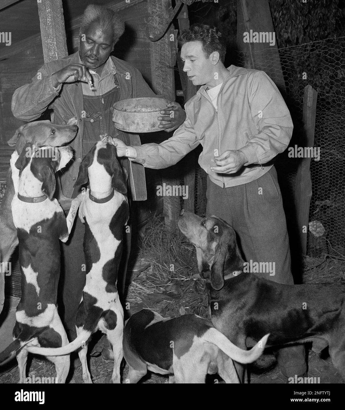Rex Ingram,left, and Dane Clark take time out from their screen chores ...