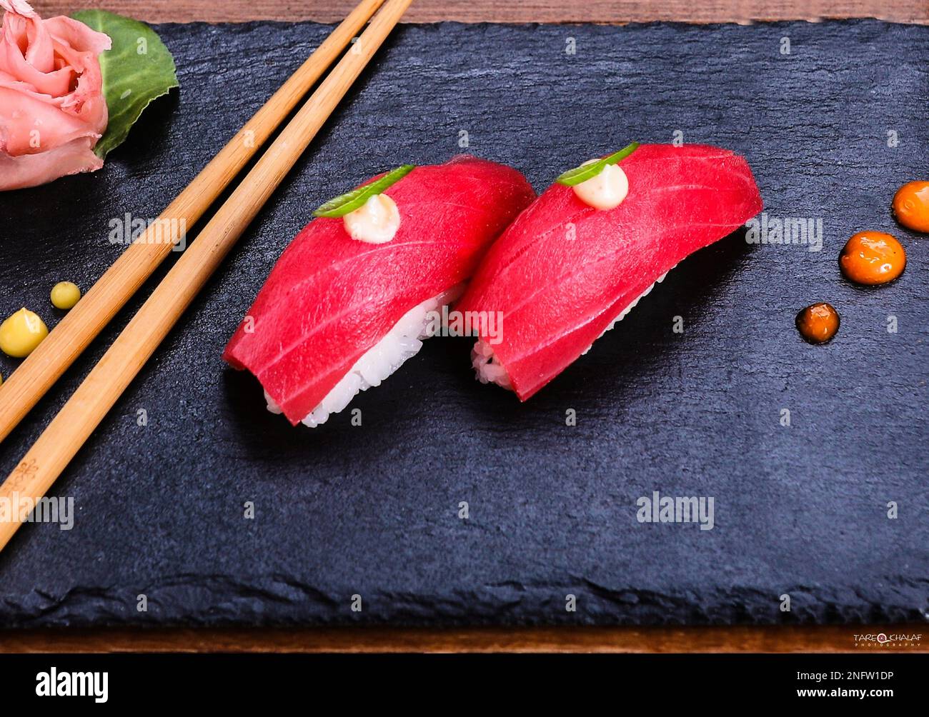 A Chinese sushi set on black kitchen board Stock Photo - Alamy