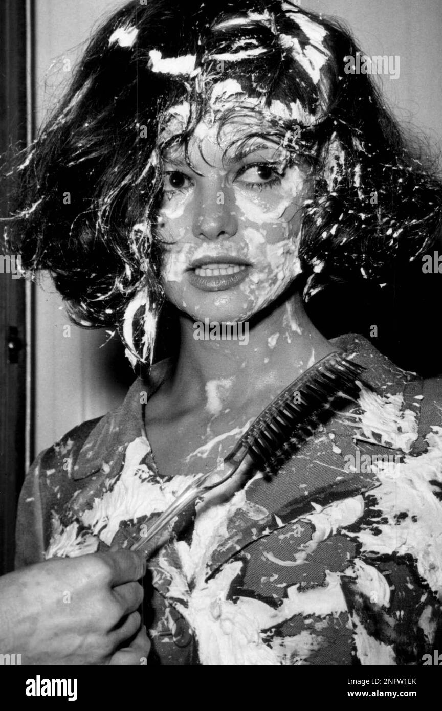 Italian actress Claudia Cardinale is covered in whipped cream following ...