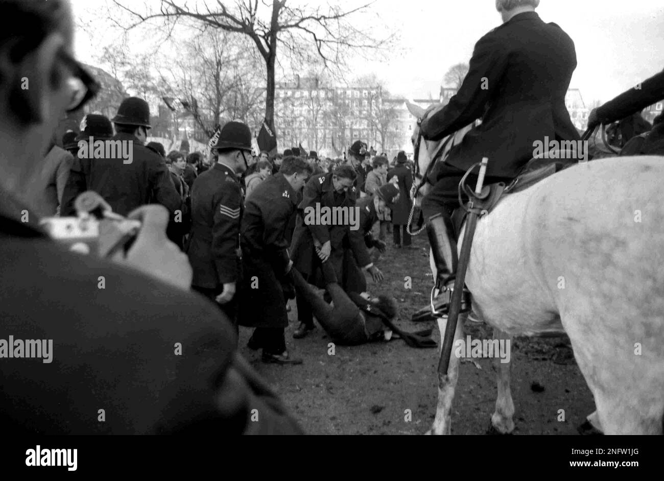 Police struggle with an anti Vietnam War demonstrator outside the ...