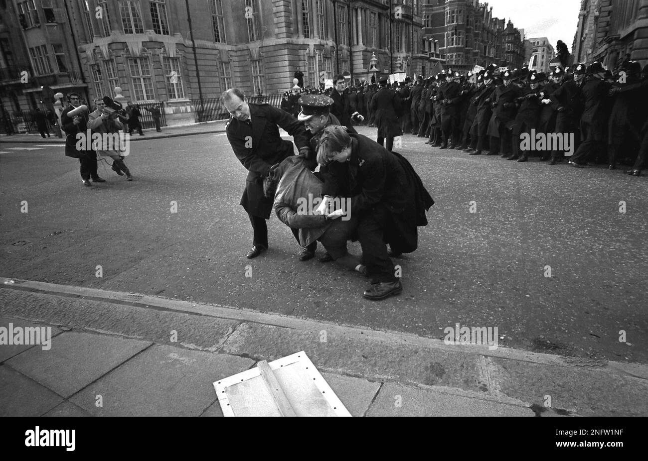 Police struggle with an anti Vietnam War demonstrator outside the ...