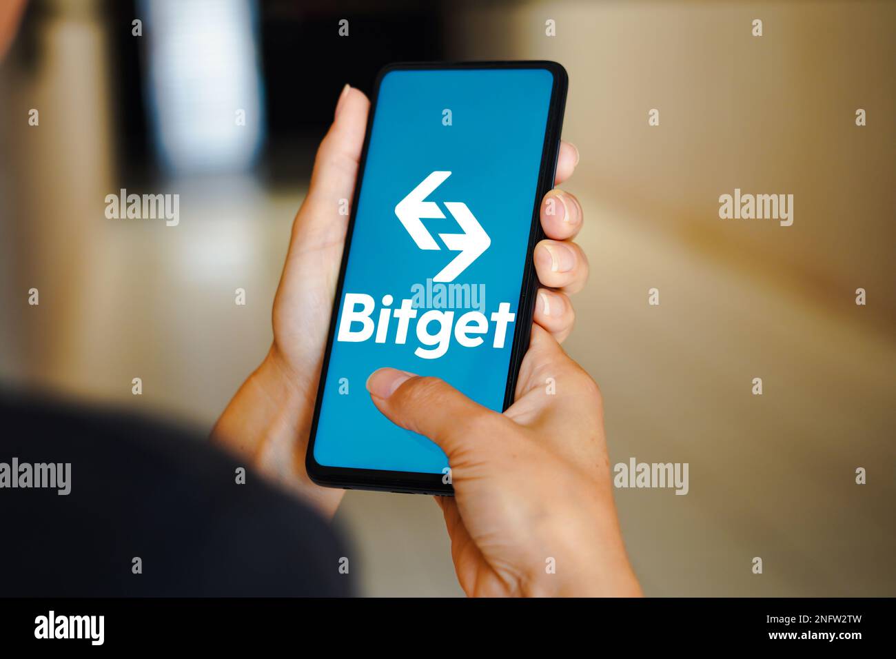 In this photo illustration, the Bitget logo is seen displayed on a ...