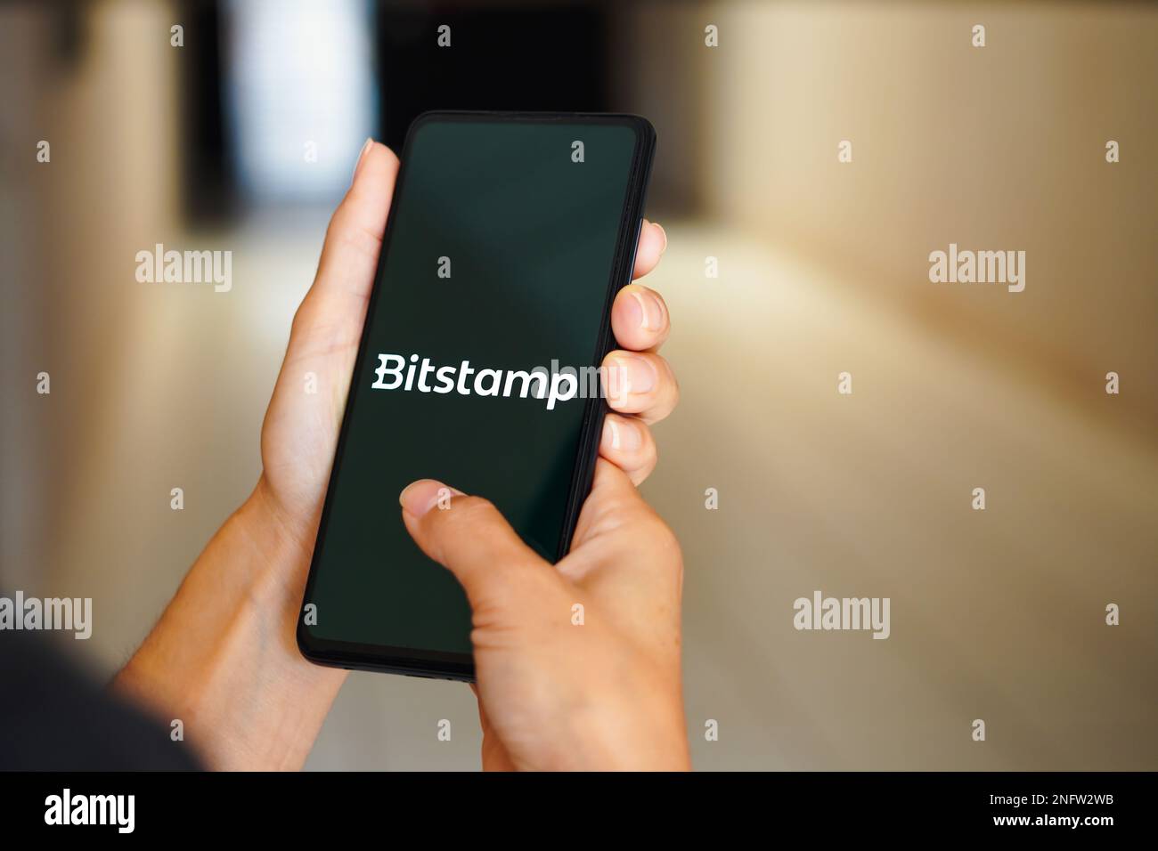In this photo illustration, the Bitstamp logo is seen displayed on a ...