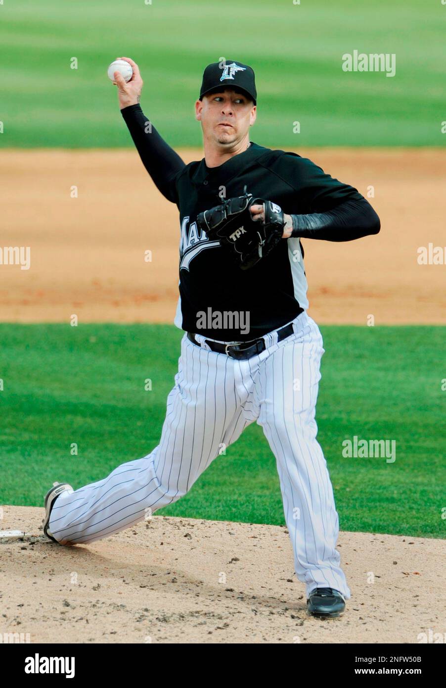 Florida Marlins pitcher Justin Miller throws to a St. Louis Cardinals ...