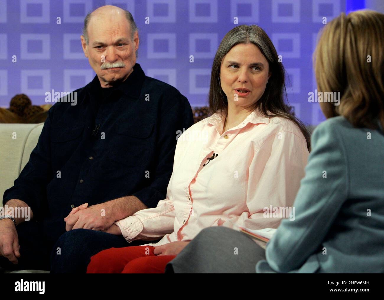 Lynn DeJac, center, from Buffalo, N.Y., who spent 13 years in prison for her teenage daughter's ...